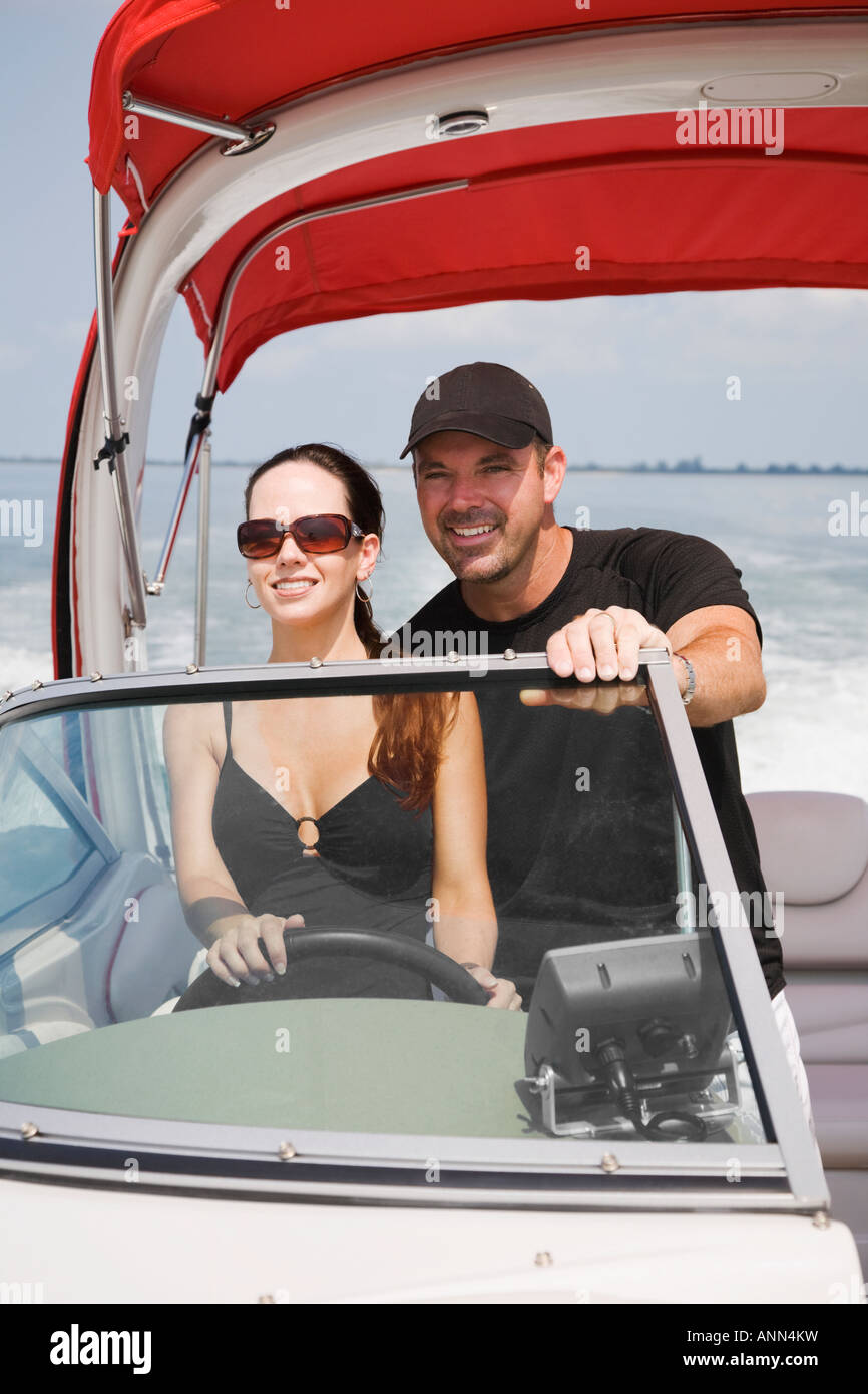 Women driving boat hi-res stock photography and images - Alamy