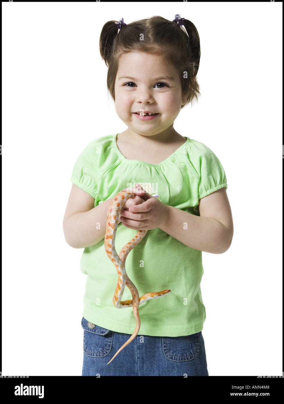 Standing childhood smiling holding innocence pets animal themes hi-res ...