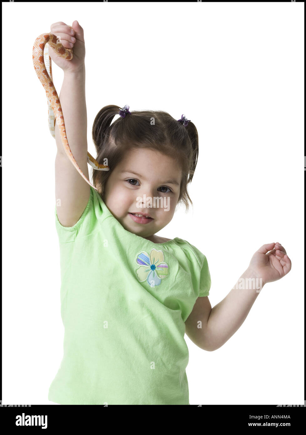 Portrait of a girl holding a snake Stock Photo - Alamy
