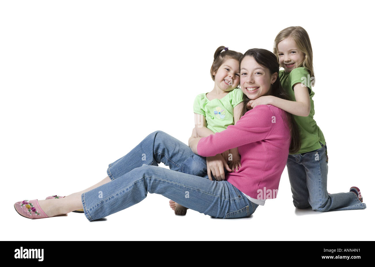 Portrait of three sisters smiling Stock Photo - Alamy