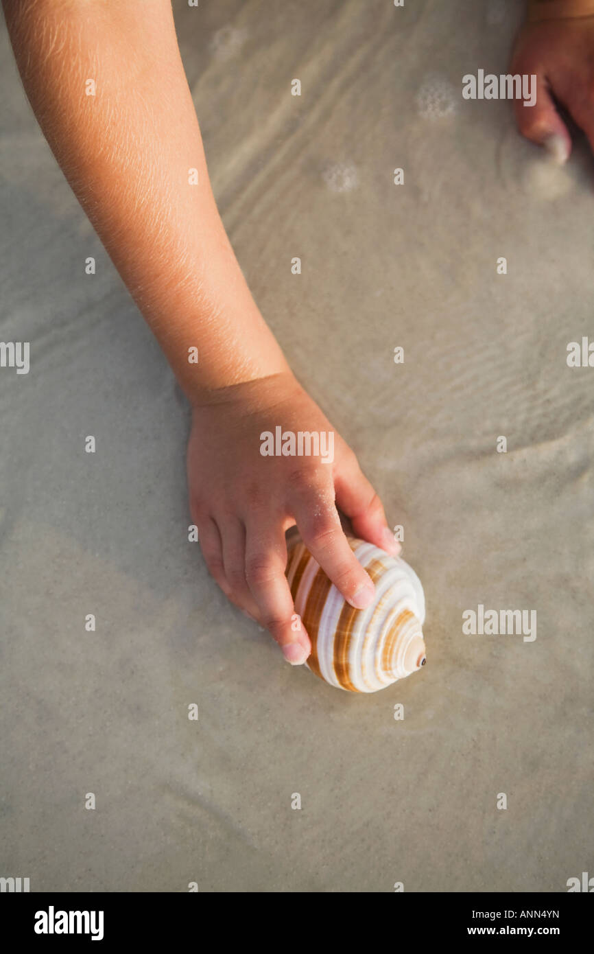 Hand grabbing sand hi-res stock photography and images - Alamy