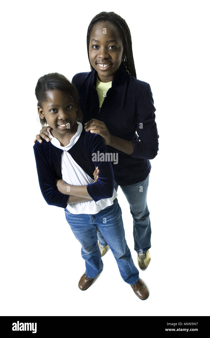 Portrait of two sisters smiling Stock Photo - Alamy