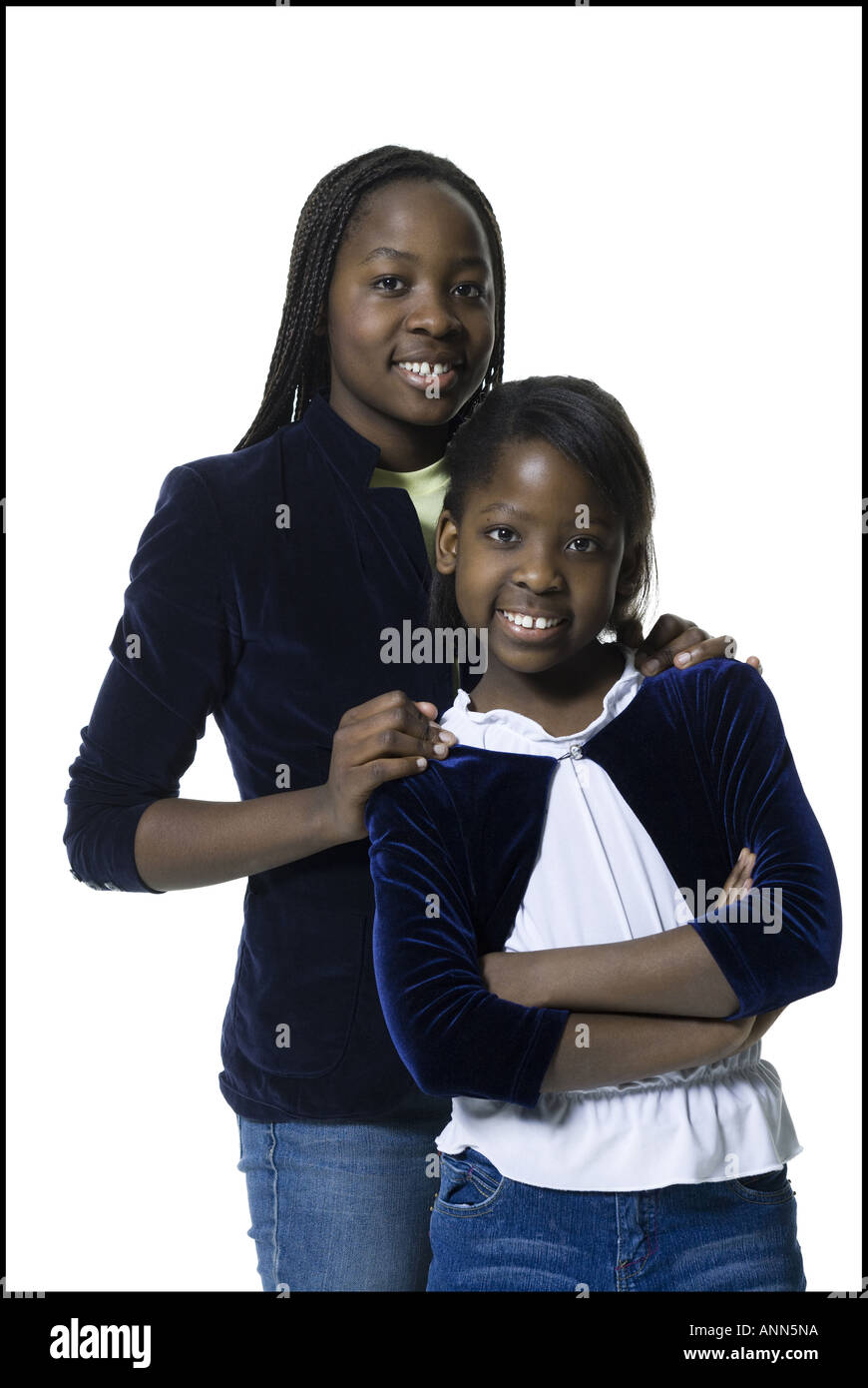 Portrait of two sisters smiling Stock Photo - Alamy