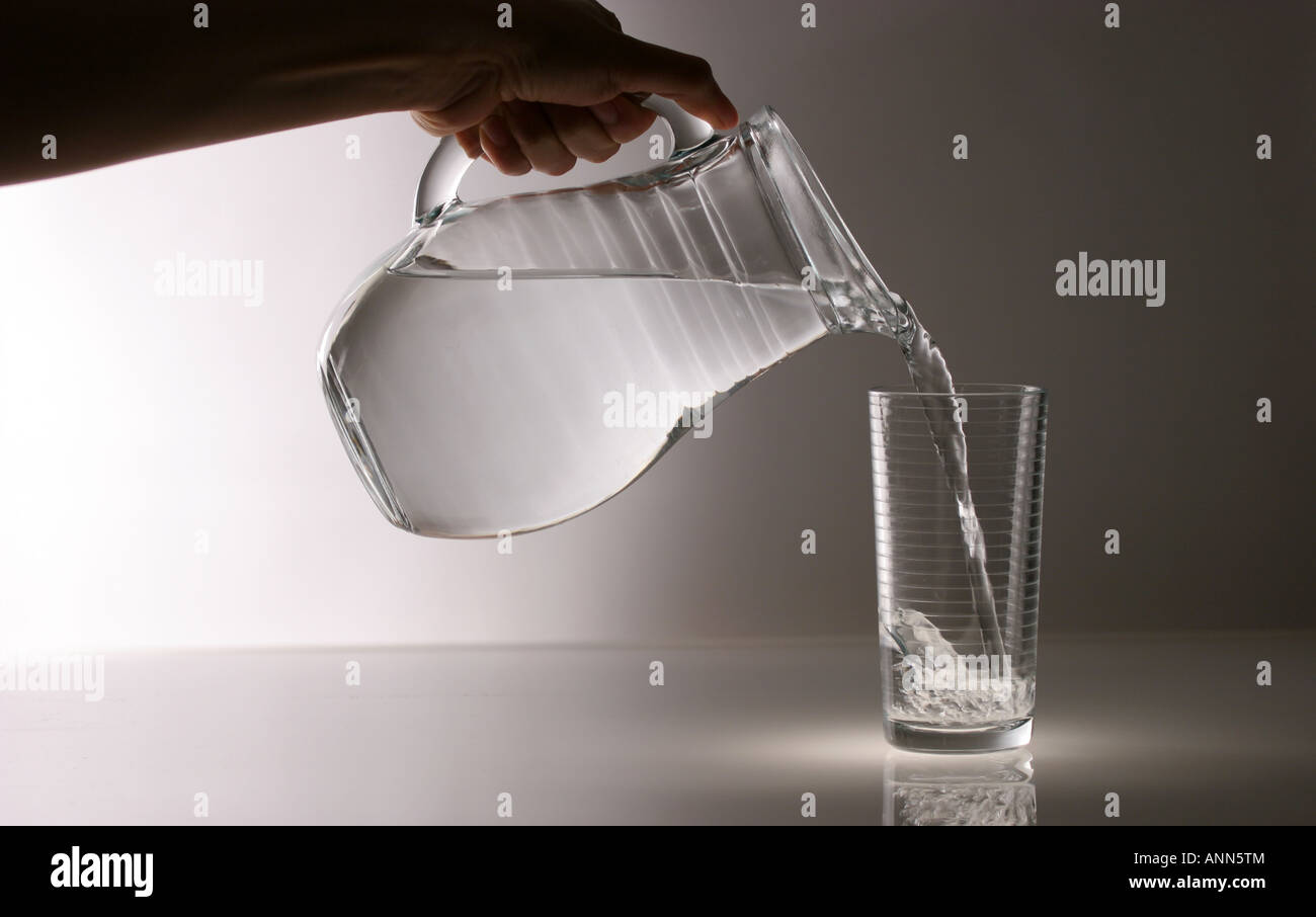Water being poured Stock Photo - Alamy