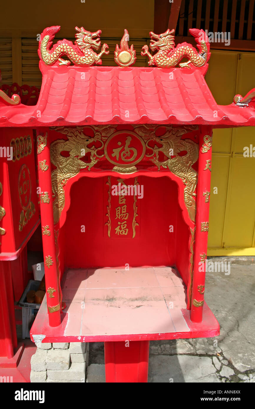 Small red traditional chinese family shrine with dragon motif Stock ...