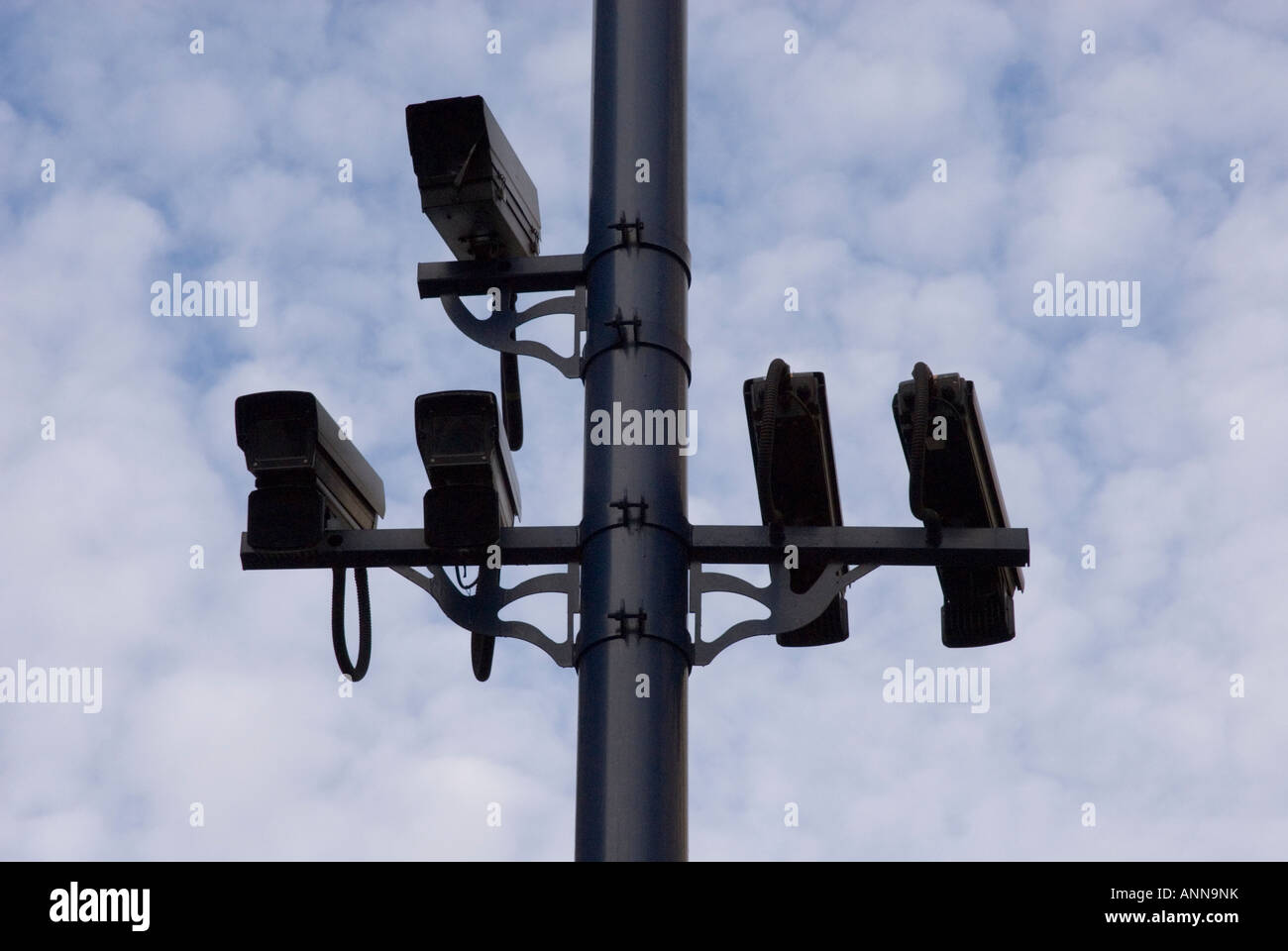 looking up at group of cctv cameras Stock Photo - Alamy