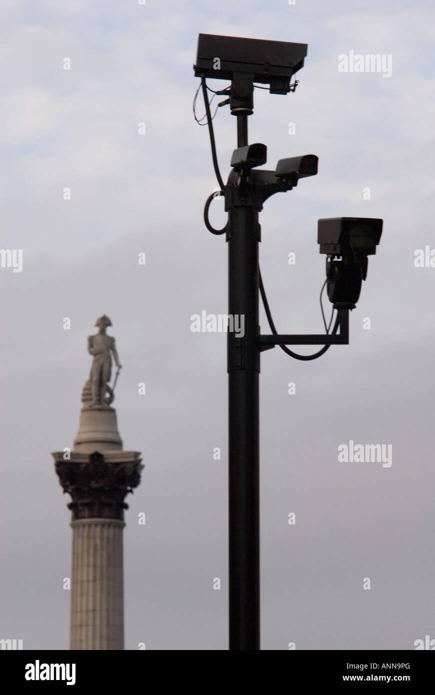 looking up at three 3 cctv cameras with Nelsons column in background ...