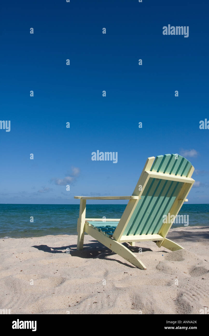 Wooden Deckchair on Beach Stock Photo - Alamy