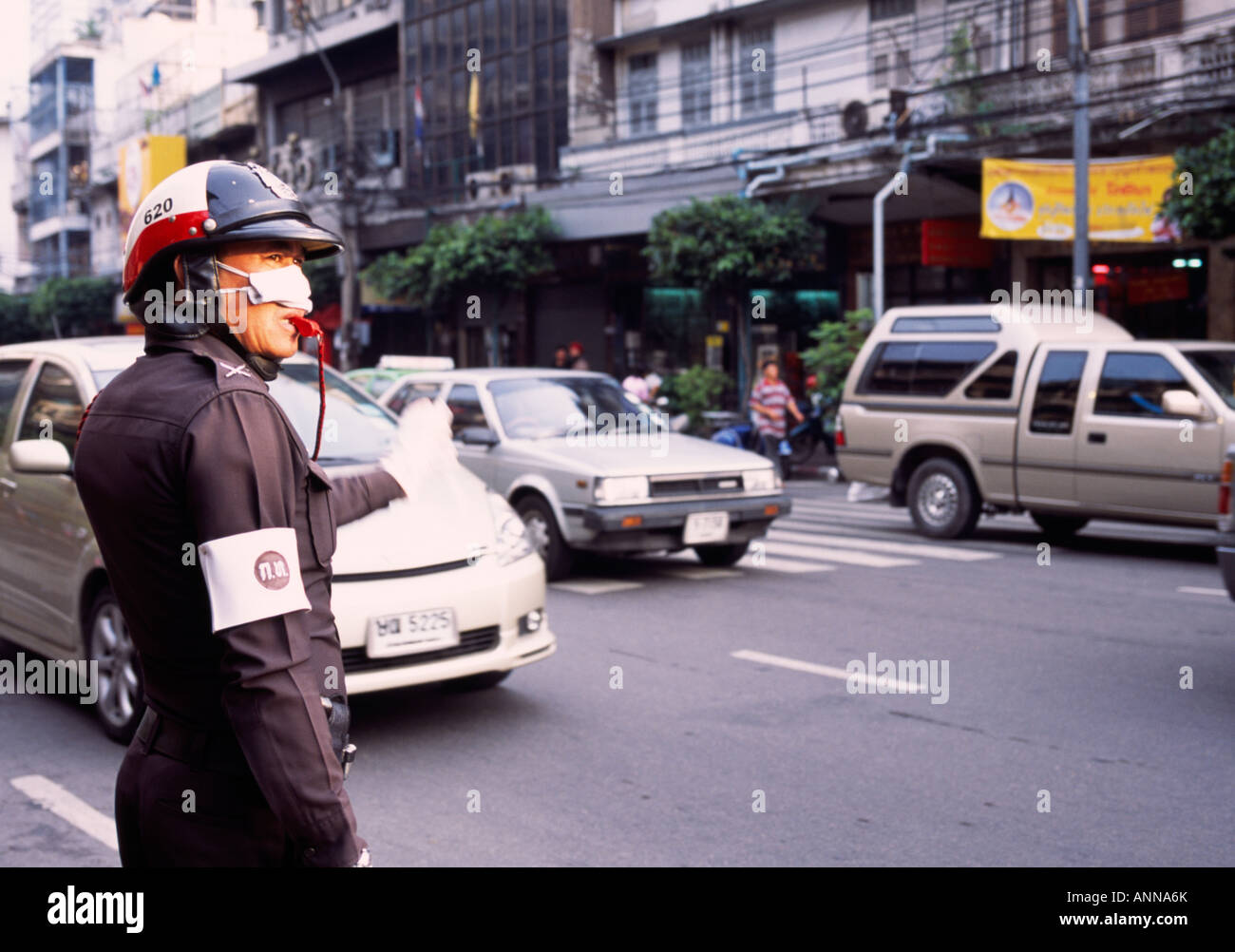 Policeman in road directing traffic vietnam hi-res stock photography ...
