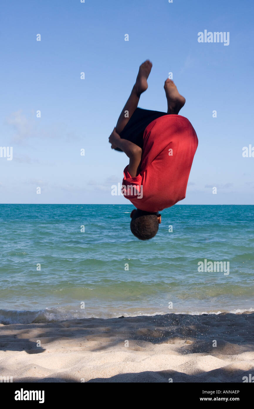 Back flip on a beach Stock Photo - Alamy