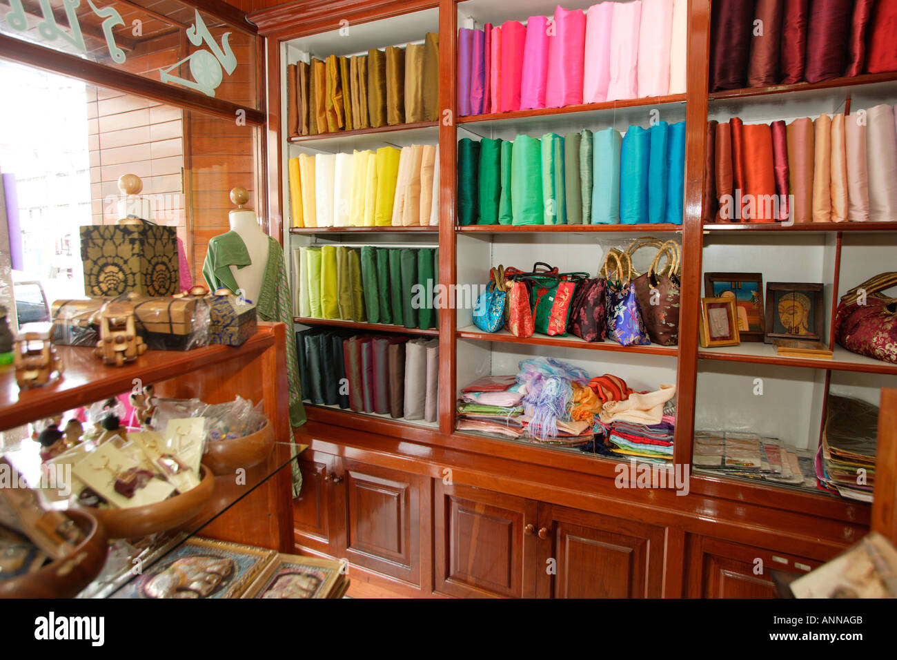Shelves full of brightly coloured silks in Rin Thai Silk shop inKhon ...