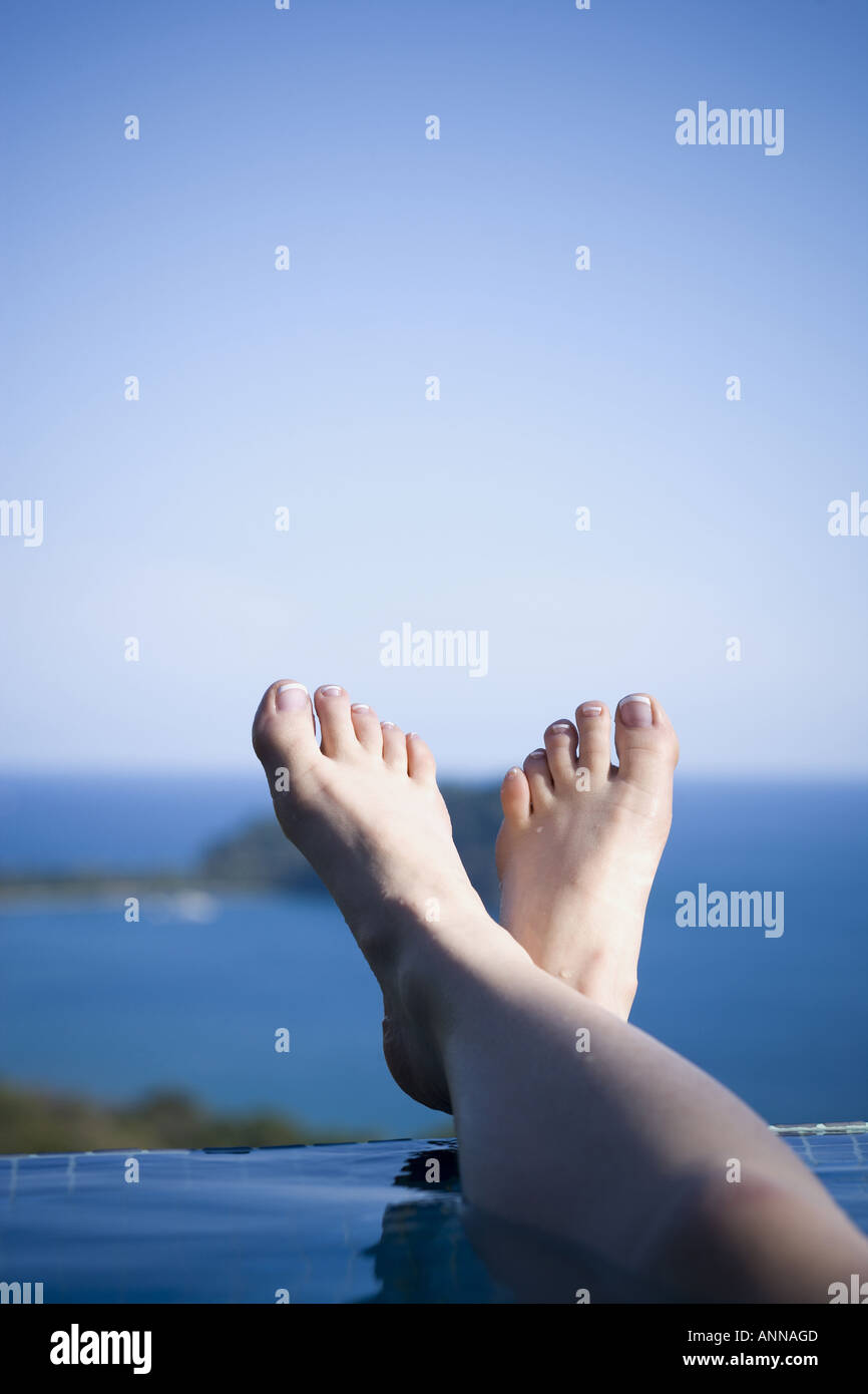 Focus on crossed feet hi-res stock photography and images - Alamy