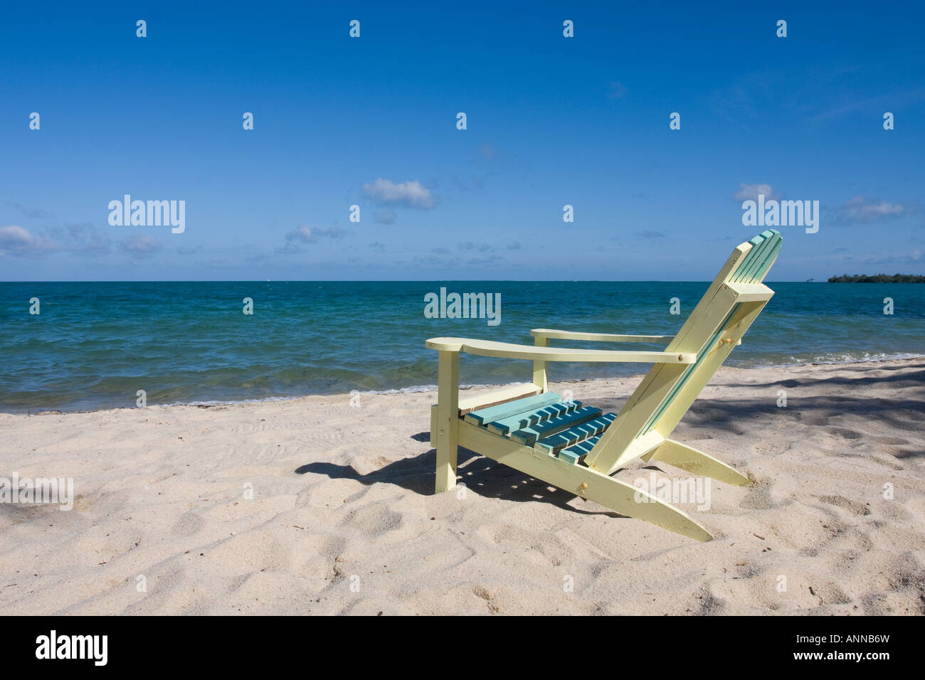 Wooden Deckchair on Beach Stock Photo - Alamy