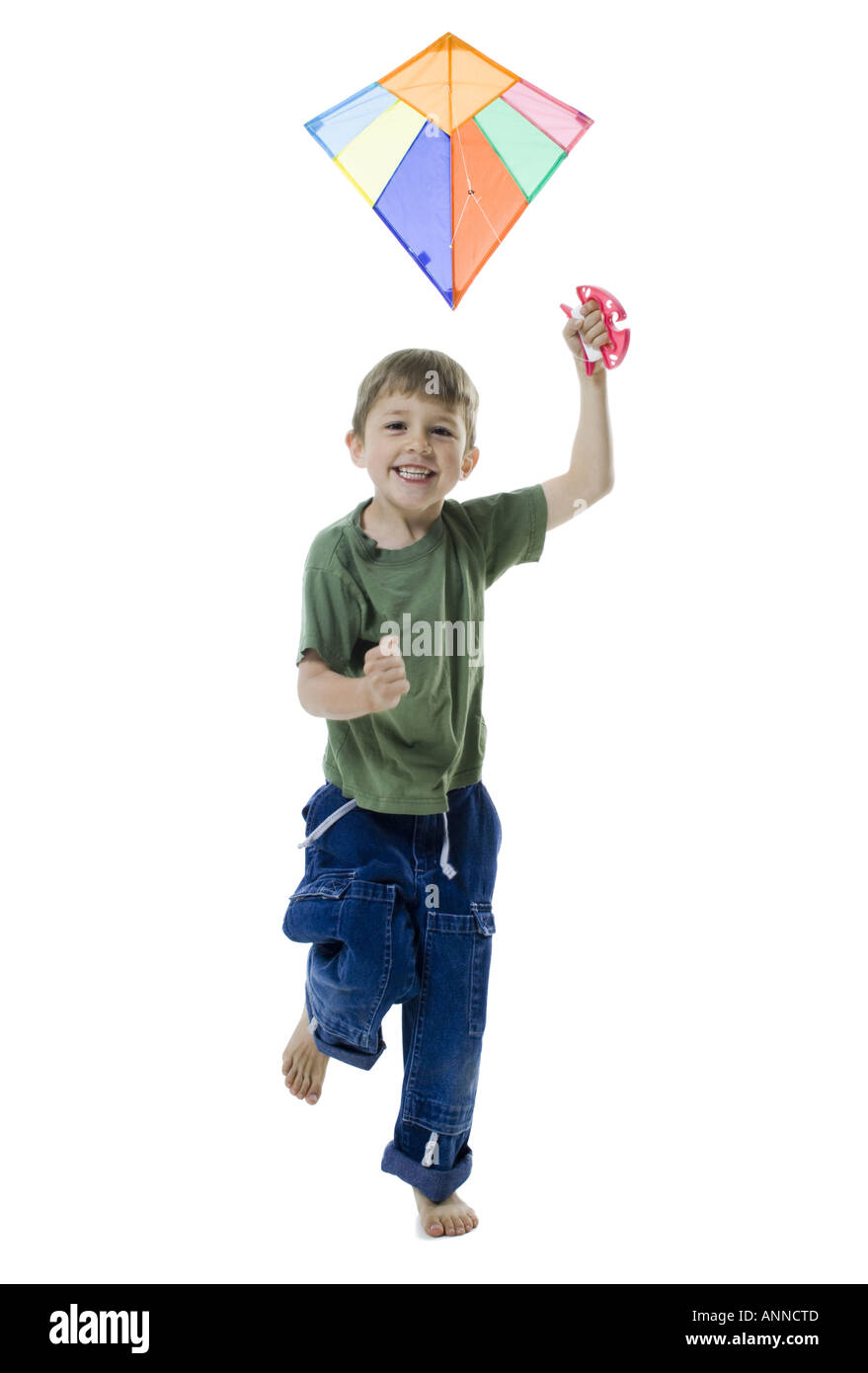 Portrait of a boy flying a kite Stock Photo - Alamy