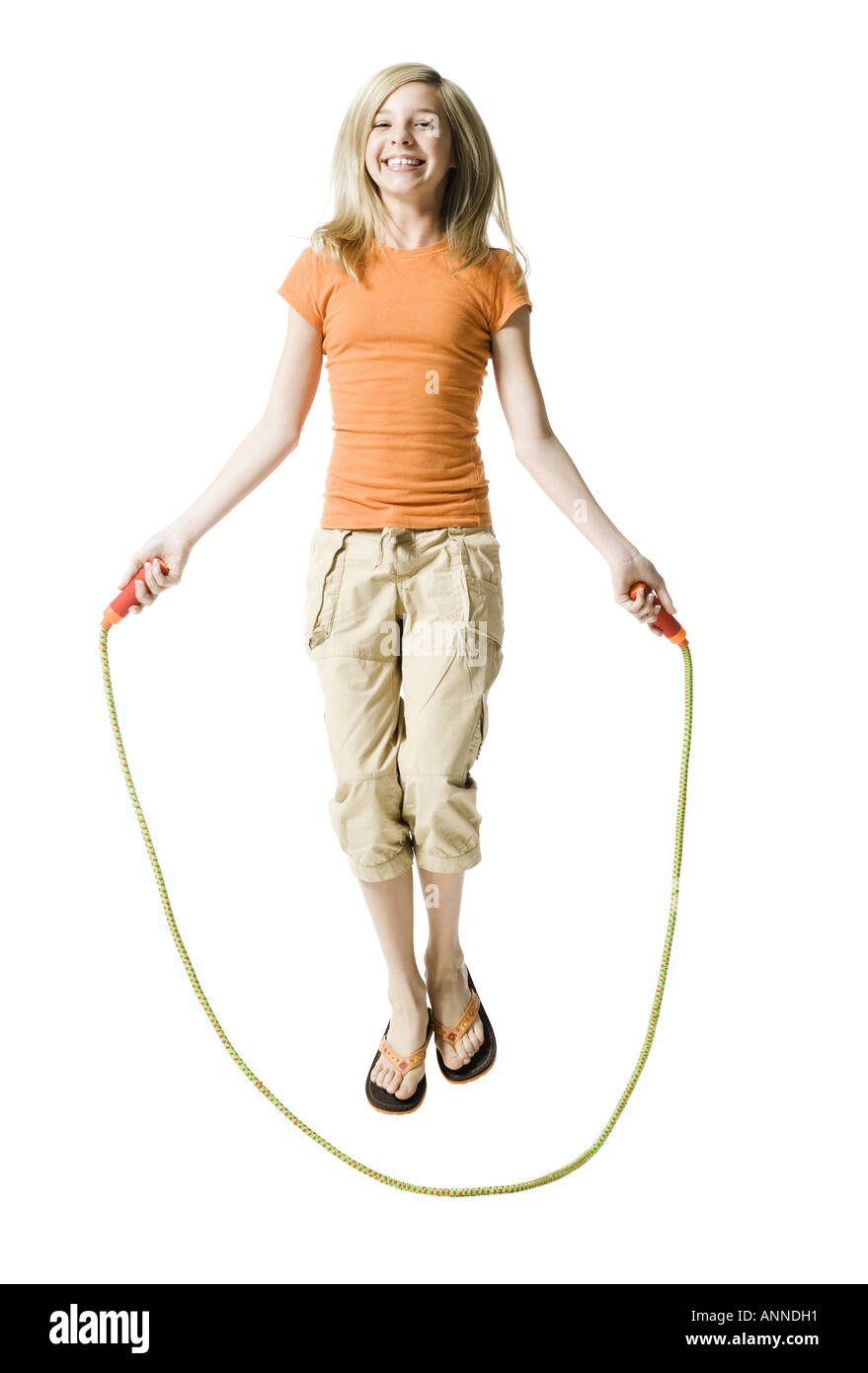 Portrait of a girl jumping rope Stock Photo - Alamy