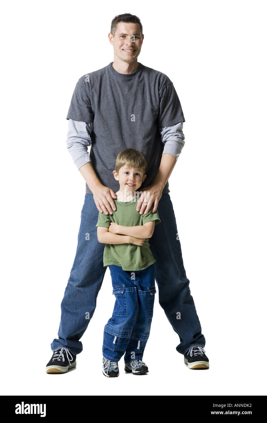 Portrait of a father and his son smiling Stock Photo - Alamy