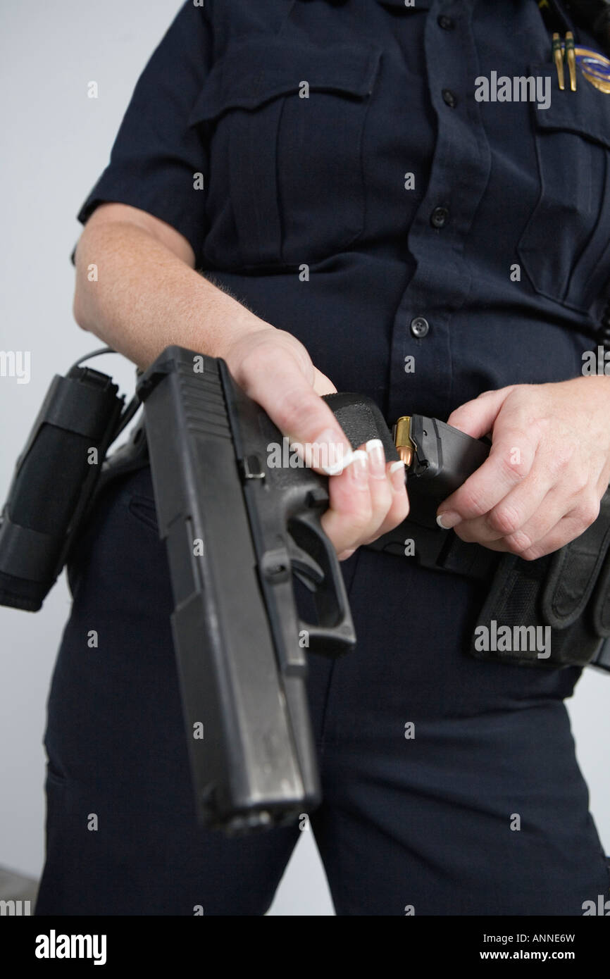 Woman loading gun hi-res stock photography and images - Alamy