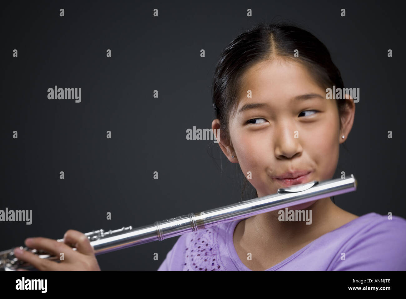 Child playing flute hi-res stock photography and images - Alamy