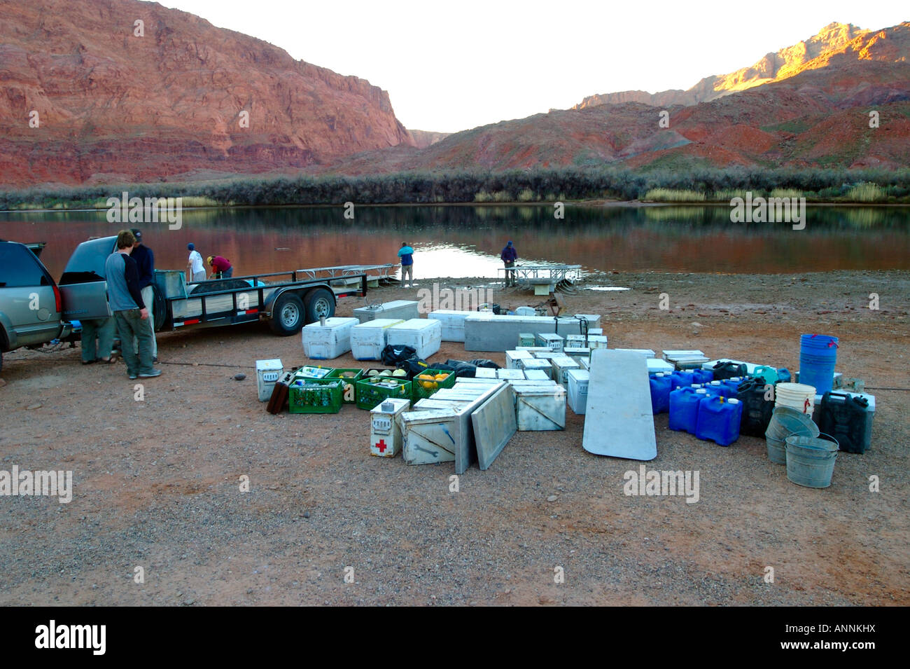 People unloading coolers and gear Lee's Ferry for a whitewater river ...