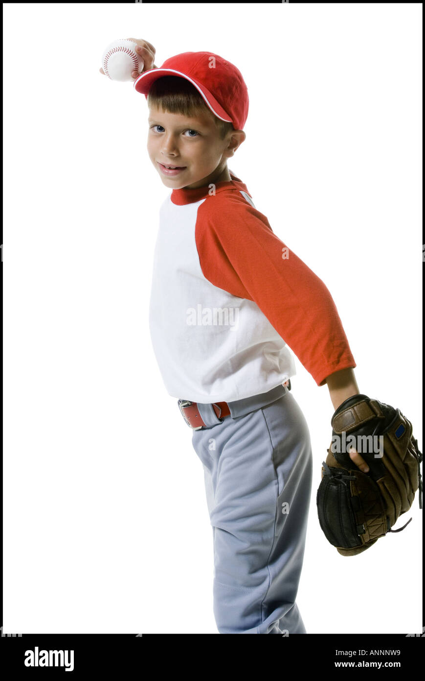 Portrait of a baseball player throwing a baseball Stock Photo - Alamy