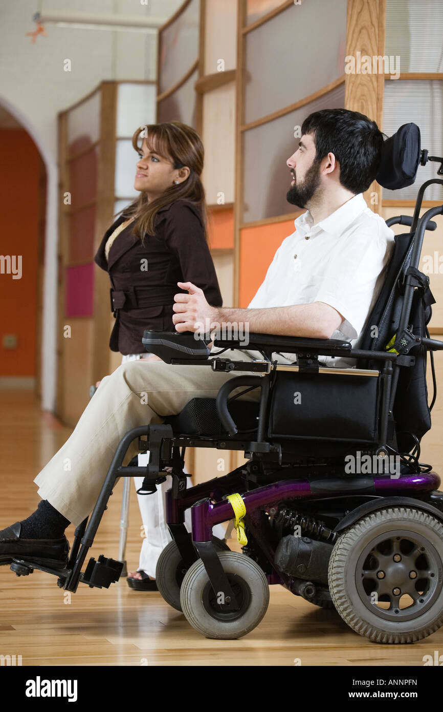 Side view of a handicapped man and woman Stock Photo - Alamy