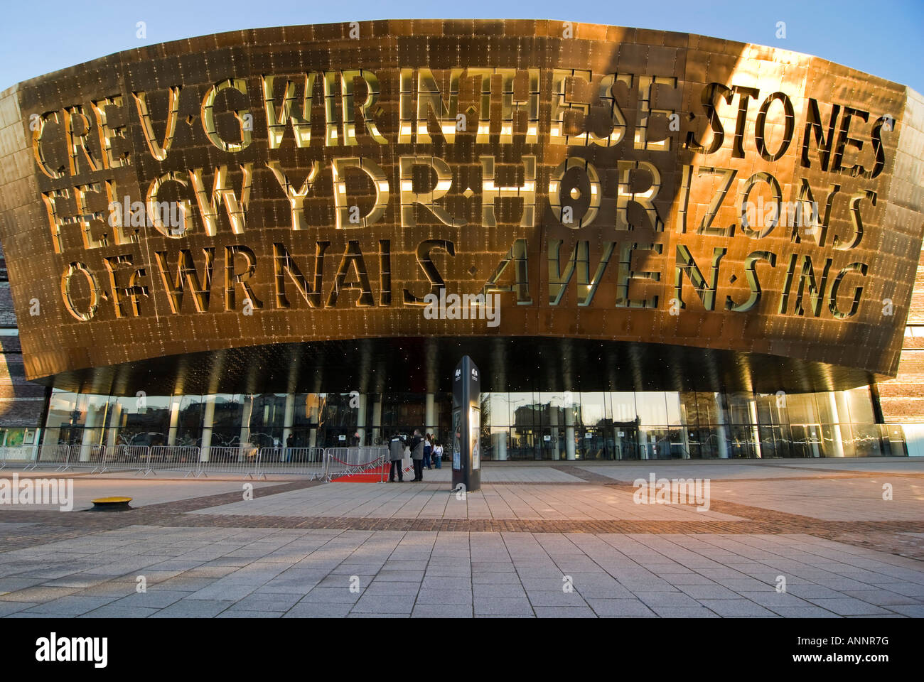 Horizontal wide angle of the bilingual inscription on the front of the ...