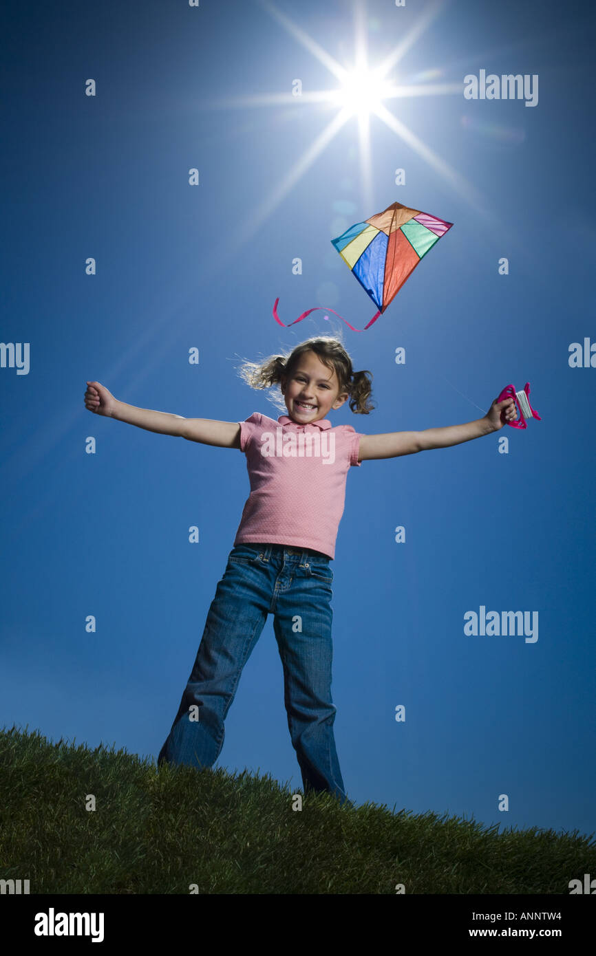 Portrait of a girl flying a kite hi-res stock photography and images ...