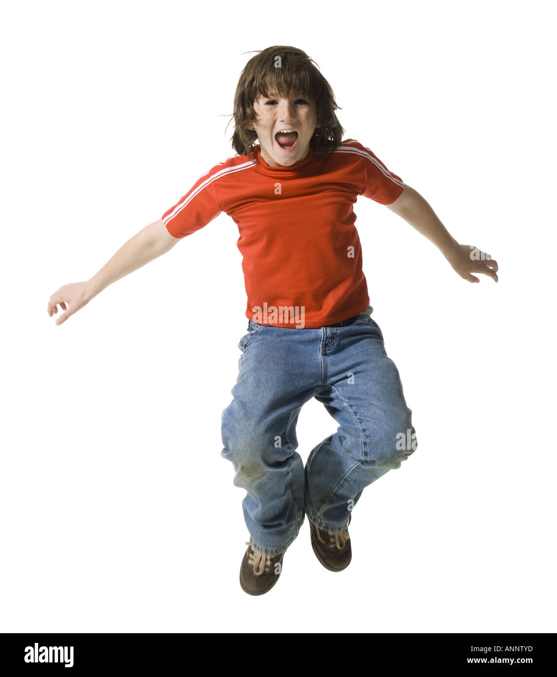 Portrait of a boy jumping in mid air Stock Photo - Alamy
