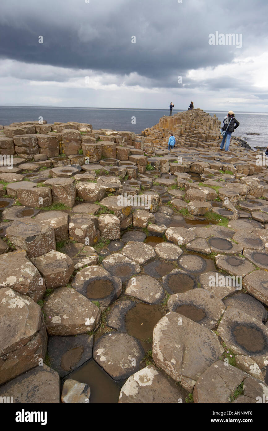 People walking on The Giant s Causeway north coast of Co Antrim ...