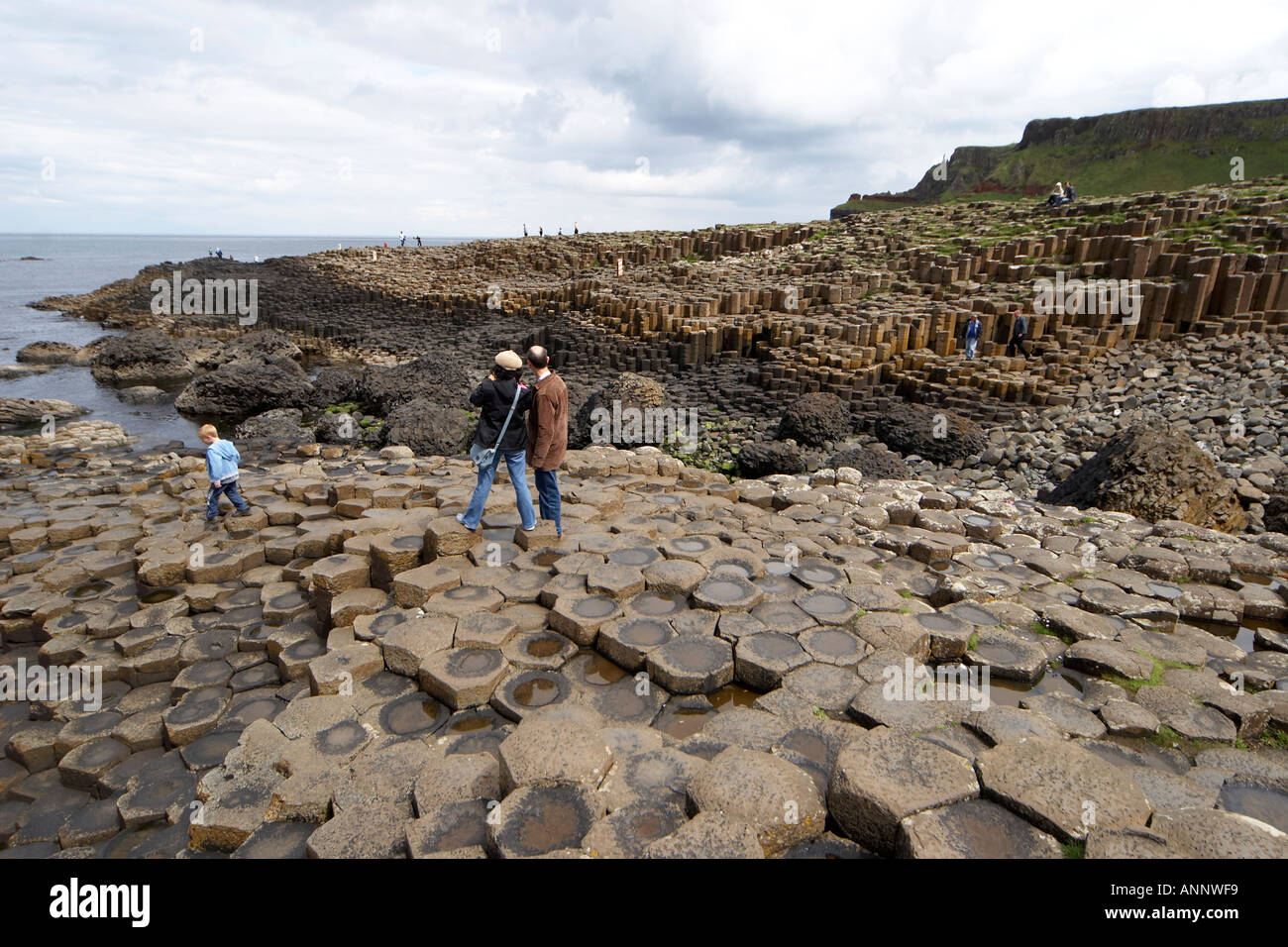 People walking on The Giant s Causeway north coast of Co Antrim ...