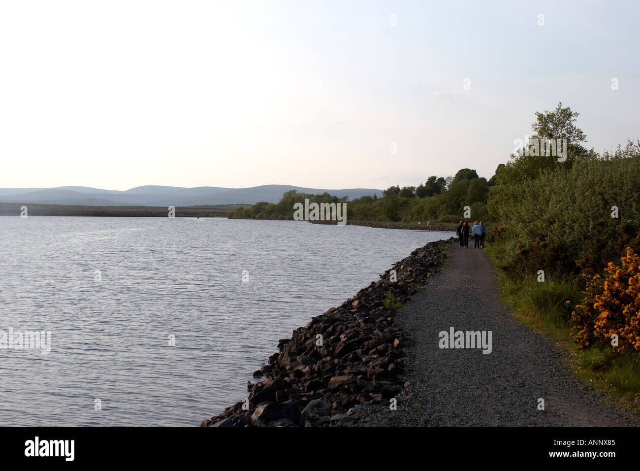 Lough Fea with strollers in the scenic Sperrin Mountains Northern ...