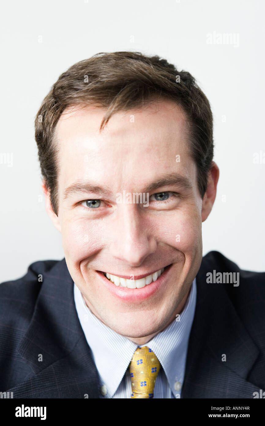 Portrait of a businessman smiling Stock Photo - Alamy