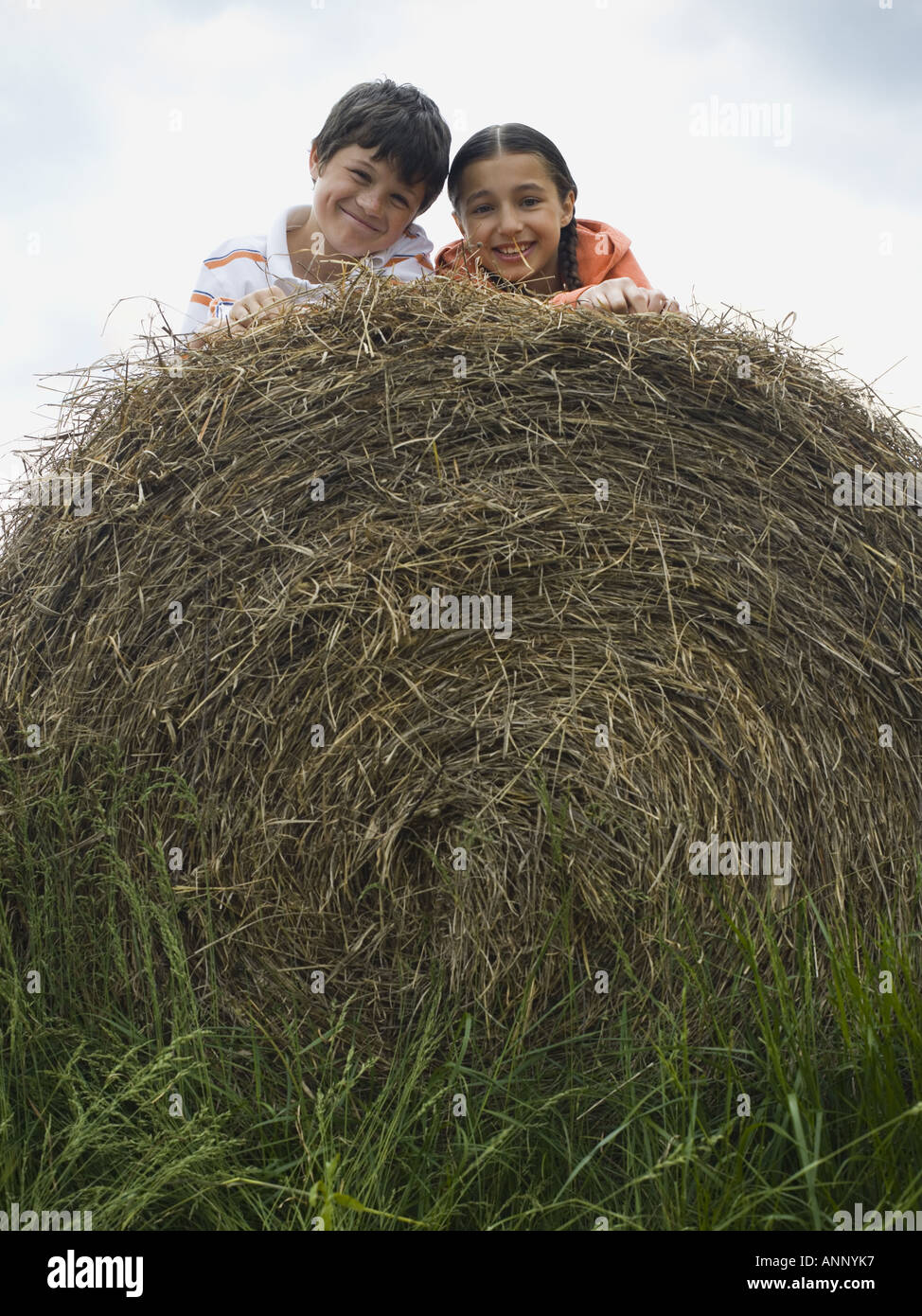 Girl lying on haystack hi-res stock photography and images - Alamy