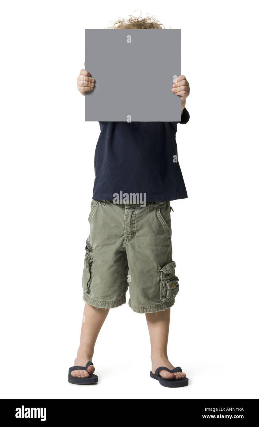 Boy in t shirt and shorts Cut Out Stock Images & Pictures - Alamy