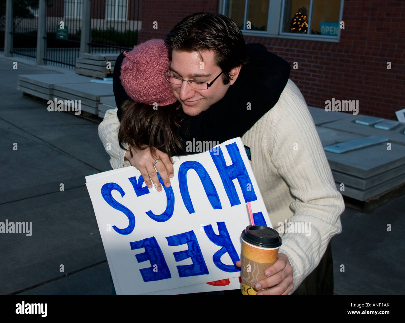 Free hugs hi-res stock photography and images - Alamy