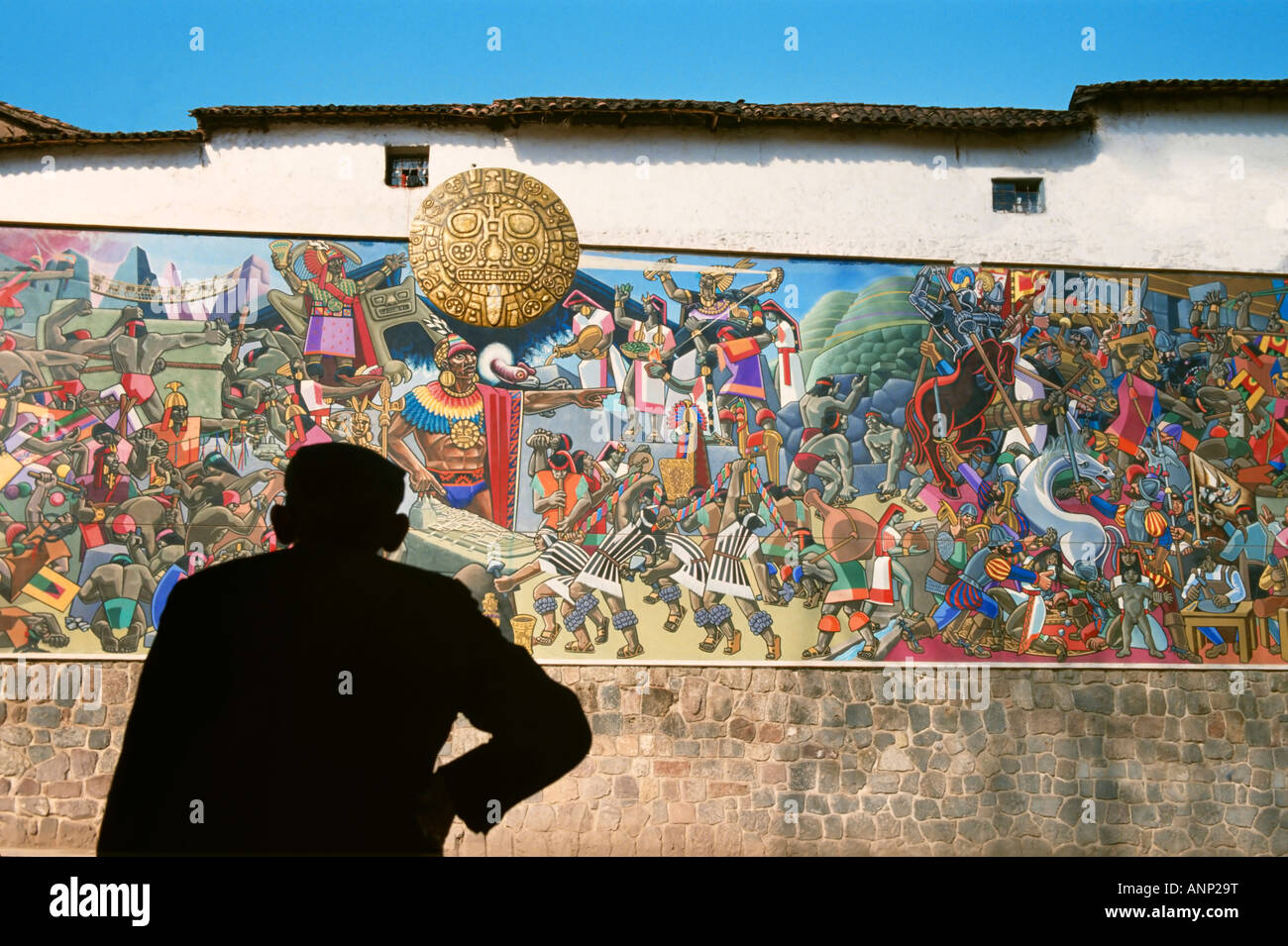 south america peru cuzco man and mural Stock Photo - Alamy