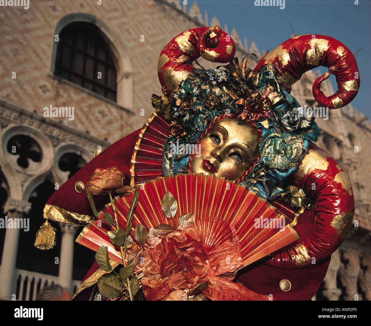 Low angle view of a person standing in a masquerade costume Stock Photo ...