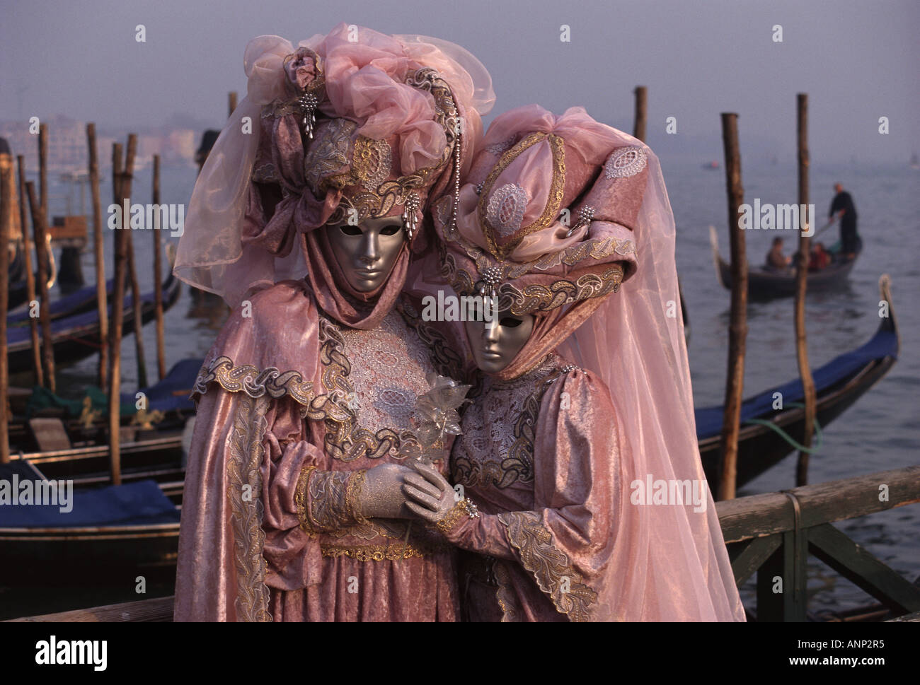 Portrait of two people in masquerade costumes Stock Photo - Alamy