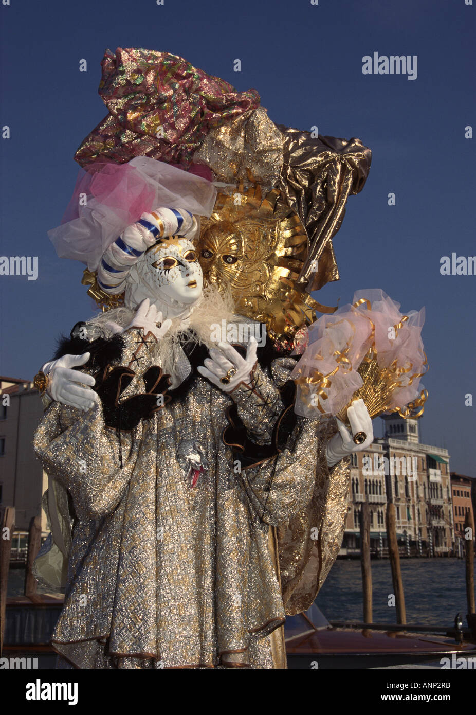 Low angle view of two people in masquerade costumes Stock Photo - Alamy