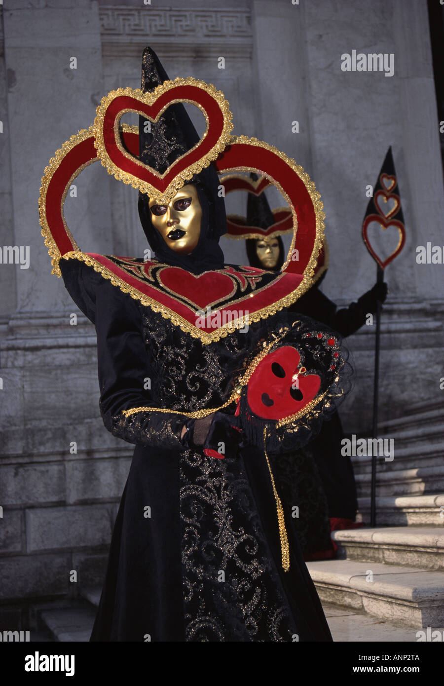 Two people in masquerade costumes Stock Photo - Alamy