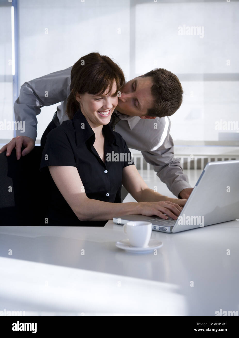 Kissing Cheek Office High Resolution Stock Photography and Images - Alamy