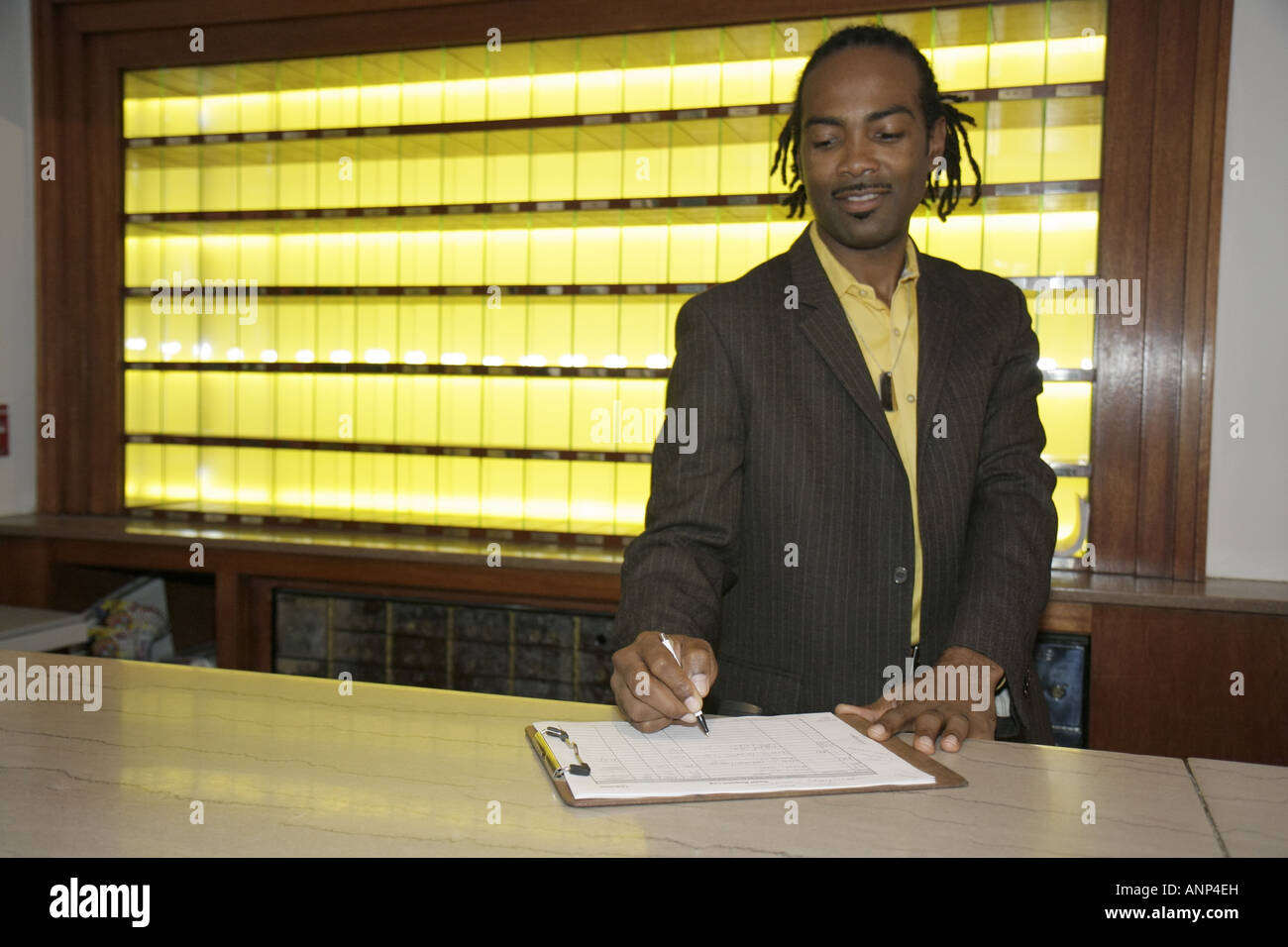 Hotel receptionist african american hi-res stock photography and images ...