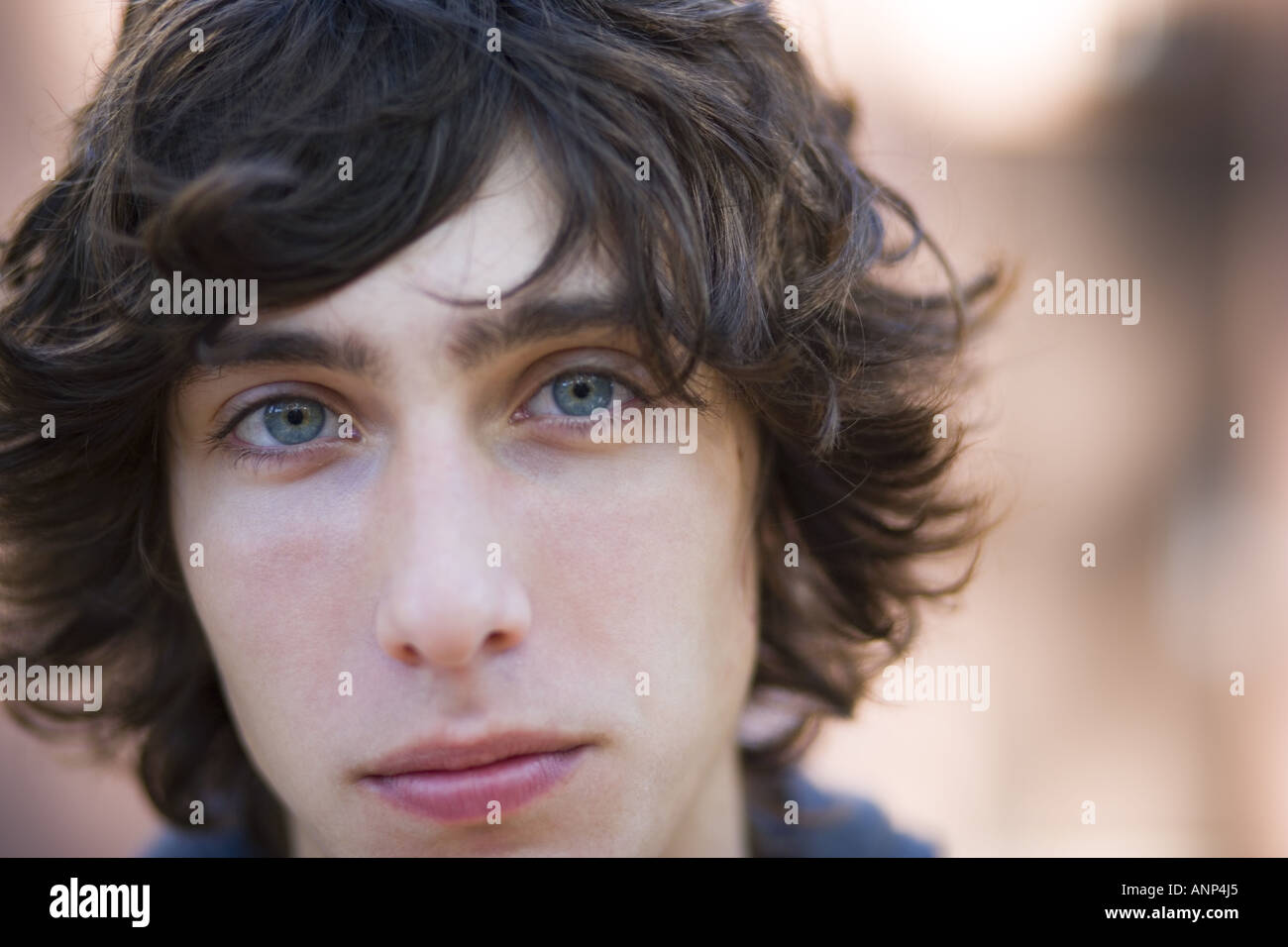 Portrait of a teenage boy thinking Stock Photo - Alamy