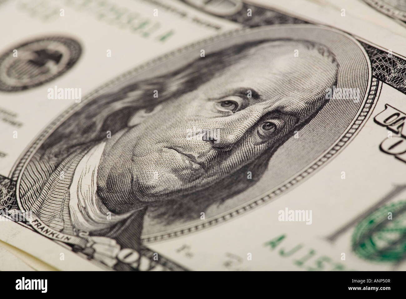 Benjamin Franklin close up from a 100 bank note Lens focused on ...