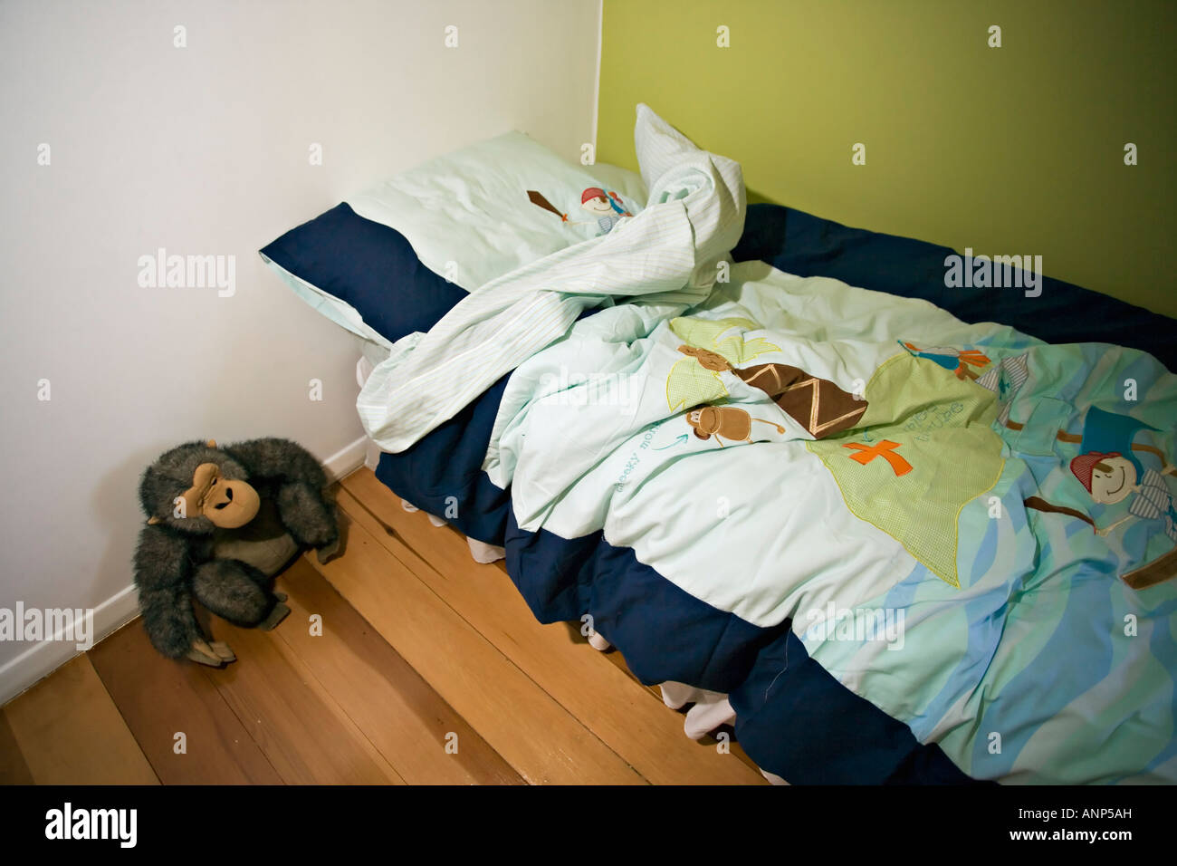 Unmade boy s bed Stock Photo - Alamy