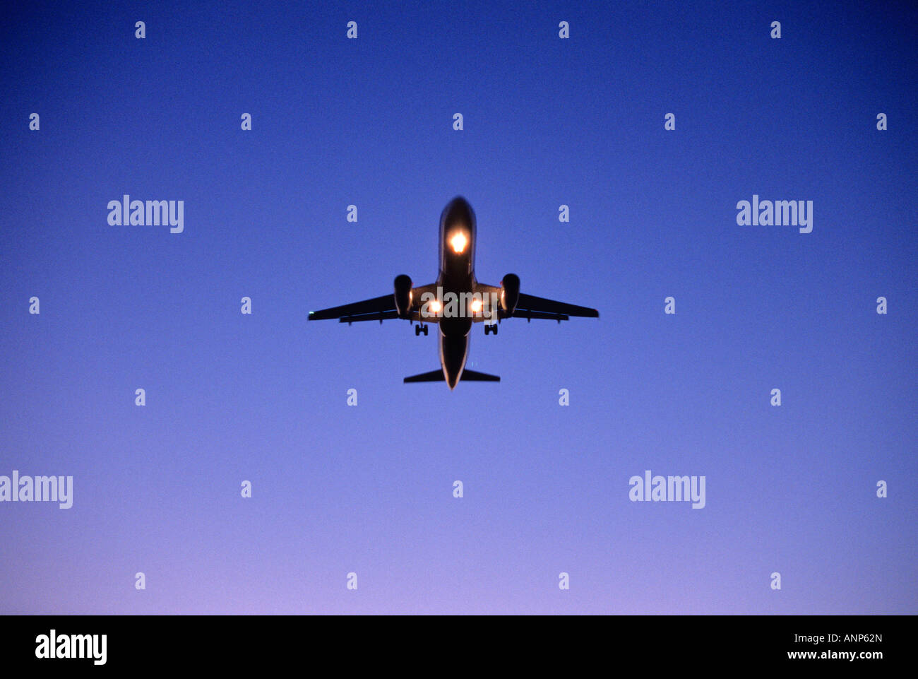 Airbus A320 is Approaching to Land After Sunset Stock Photo - Alamy