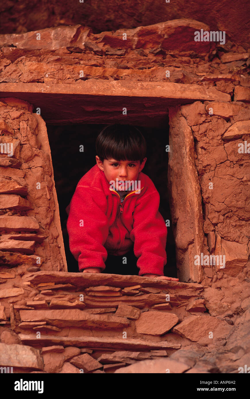 Boy looking out window black hi-res stock photography and images - Alamy