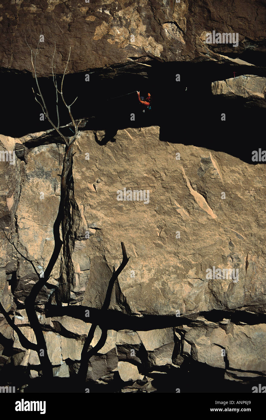 Brave man climbing rocky hi-res stock photography and images - Alamy
