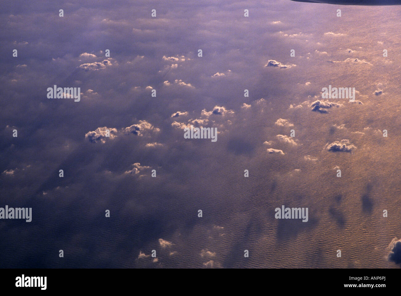 The aerial view of clouds and ocean a view from aircraft window Stock ...