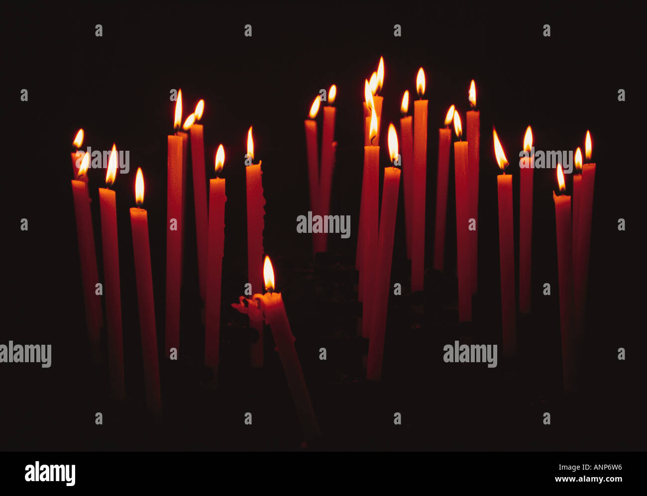 Group of lit candles Stock Photo - Alamy